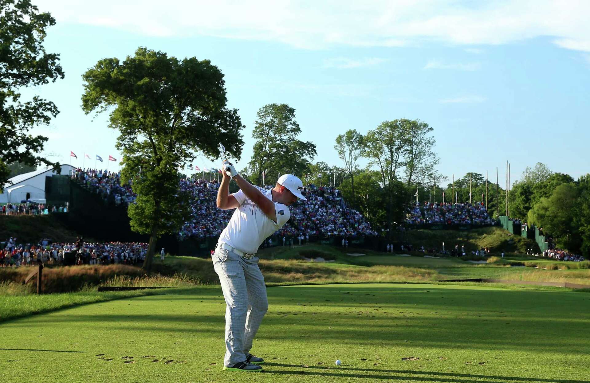 How to Get the Body to Pull the Left Arm Down in the Golf Downswing