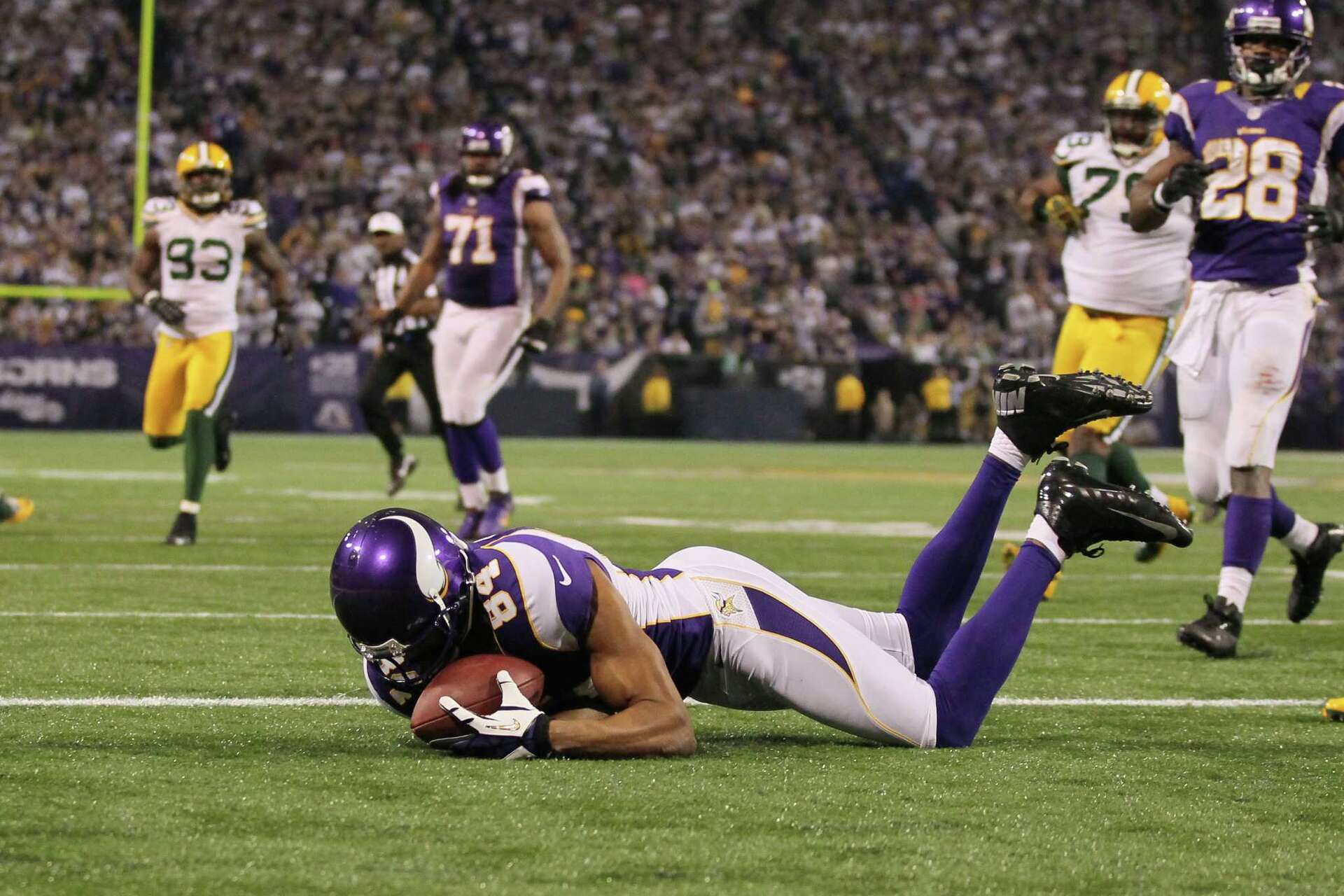 Can the Football Touch the Ground When Being Caught?