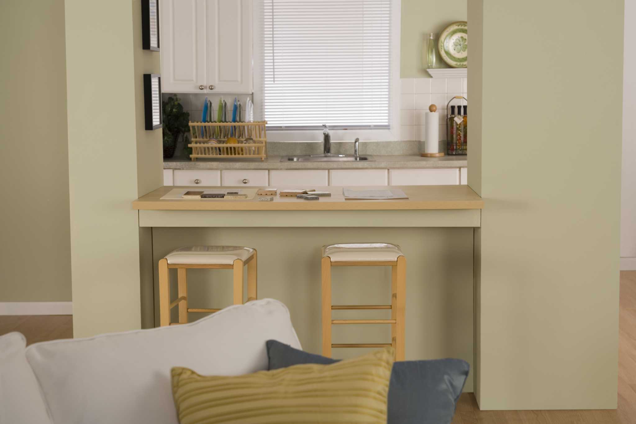 How to Hide the Sides of Kitchen Cabinets From the Living Room