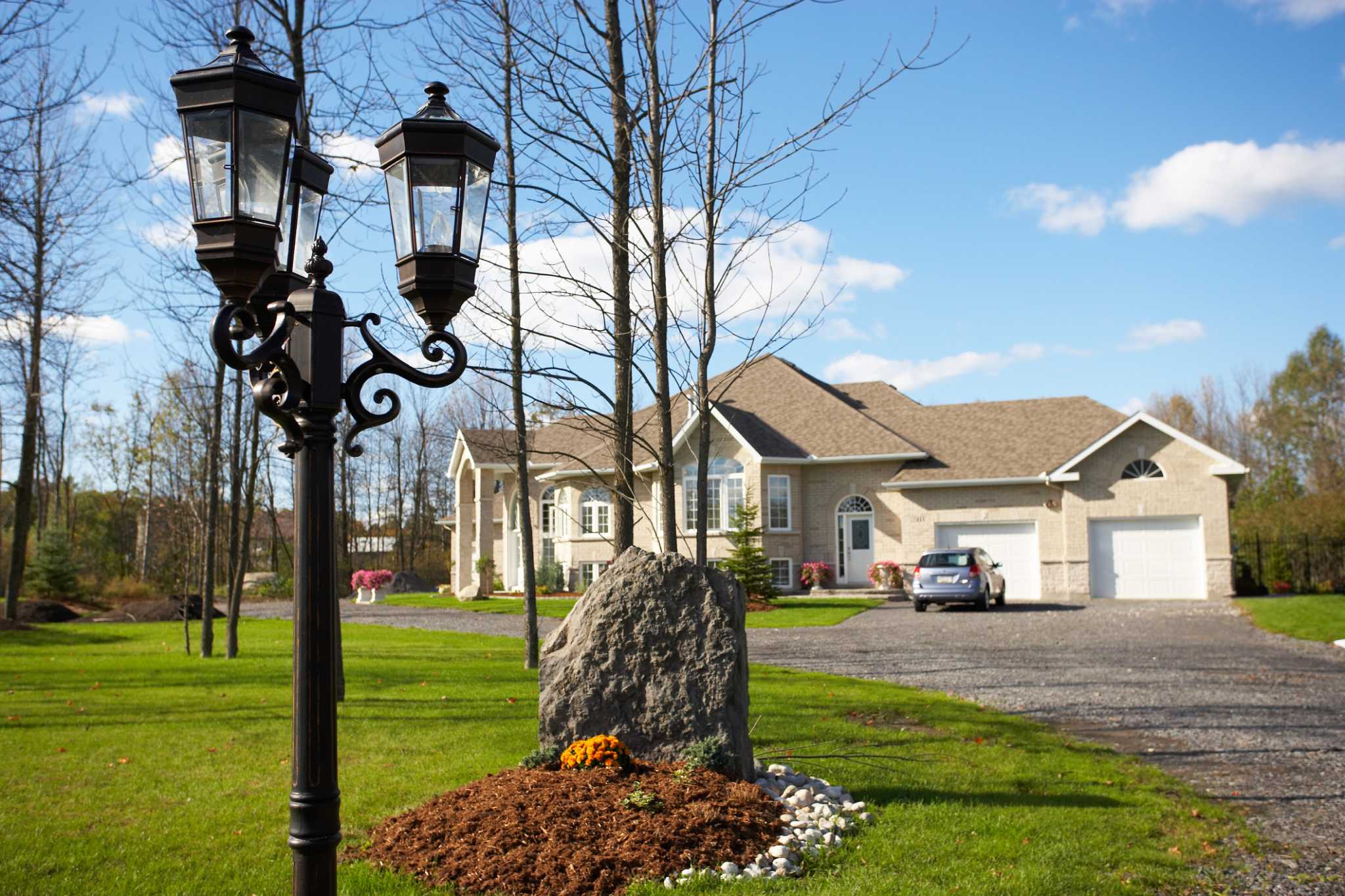 How to Install a Lamp Post With Anchor Bolts in Concrete