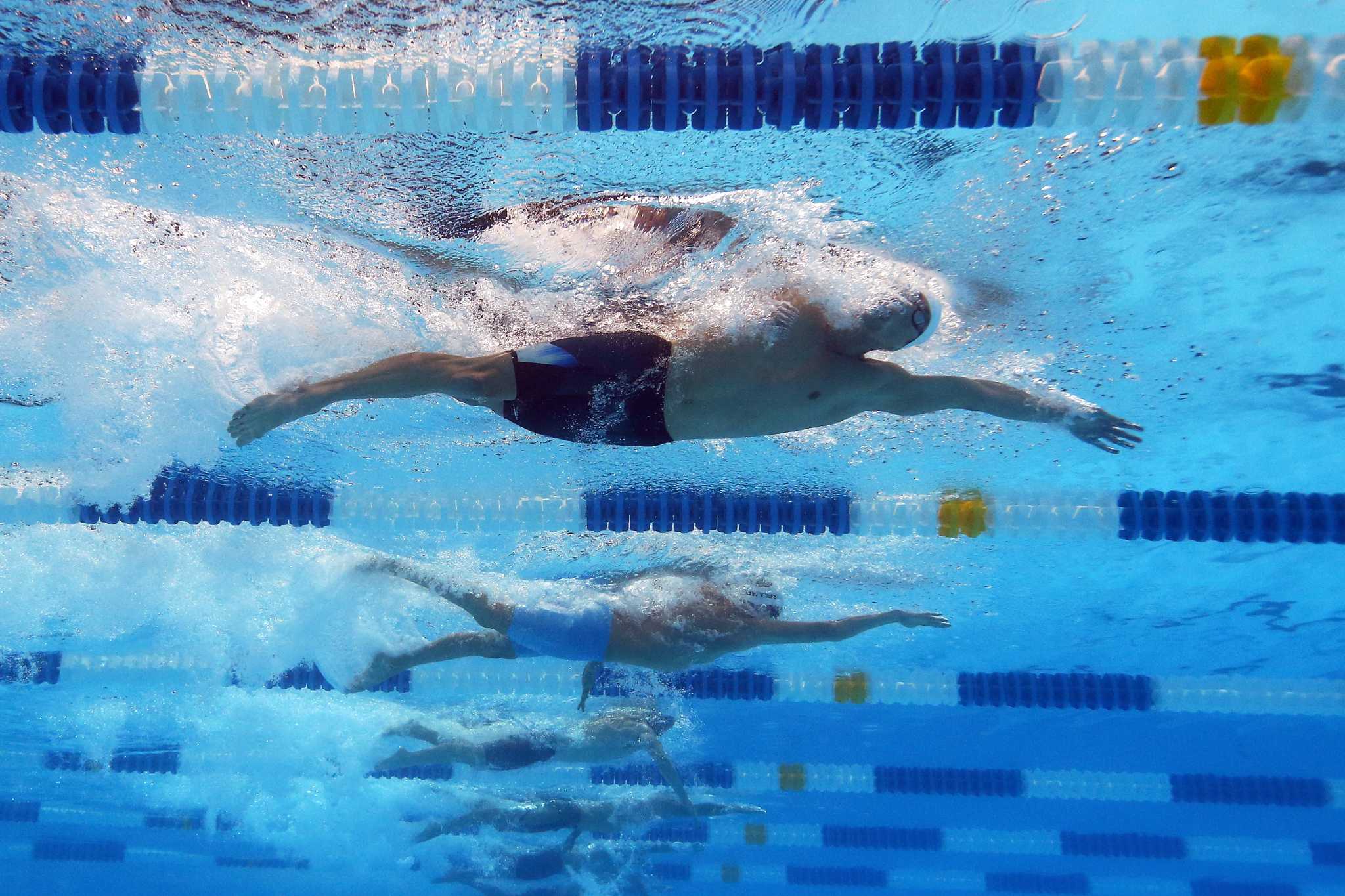 How to Push Down the Upper Body in Freestyle Swimming