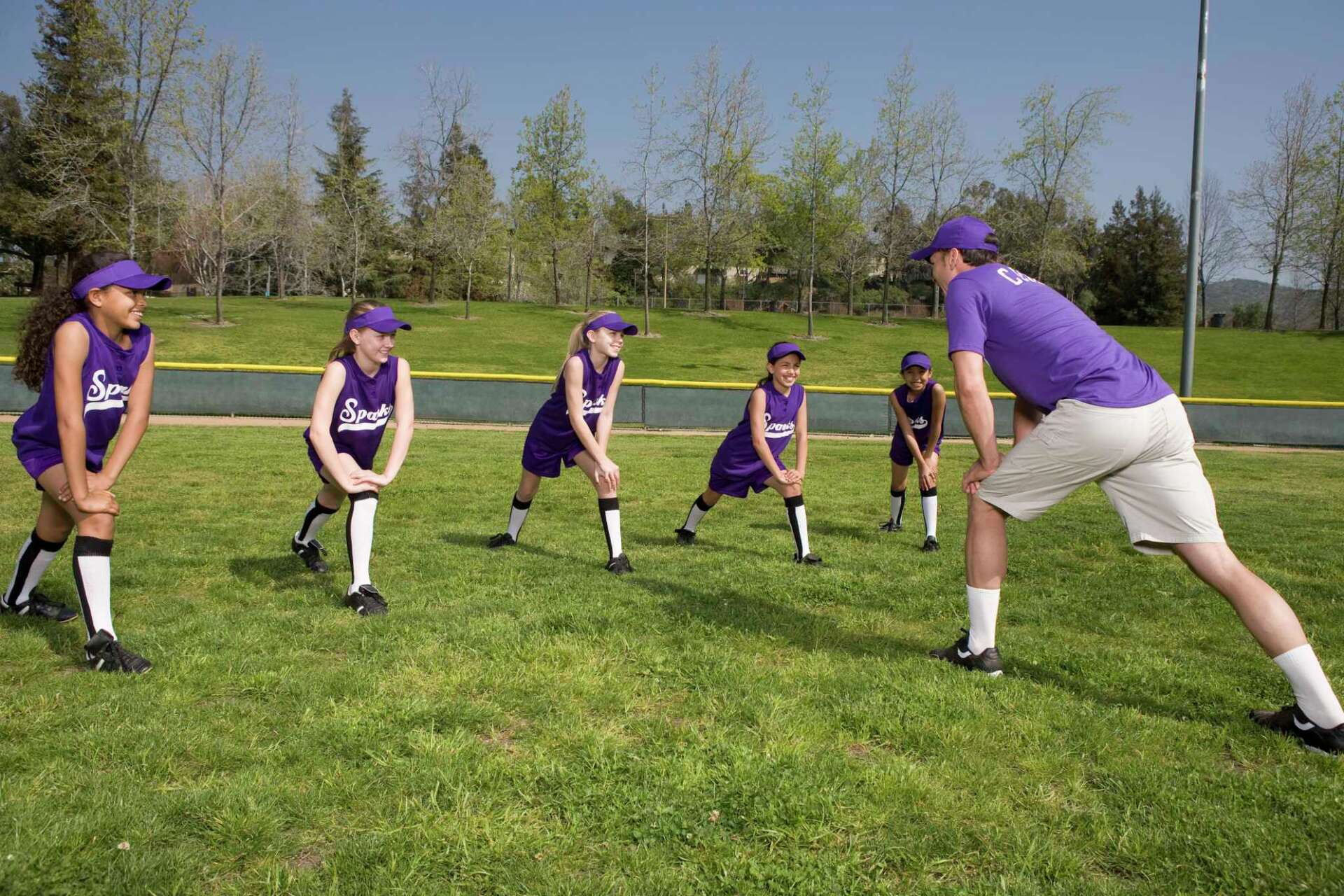 Softball Warm-Up Leg Stretching