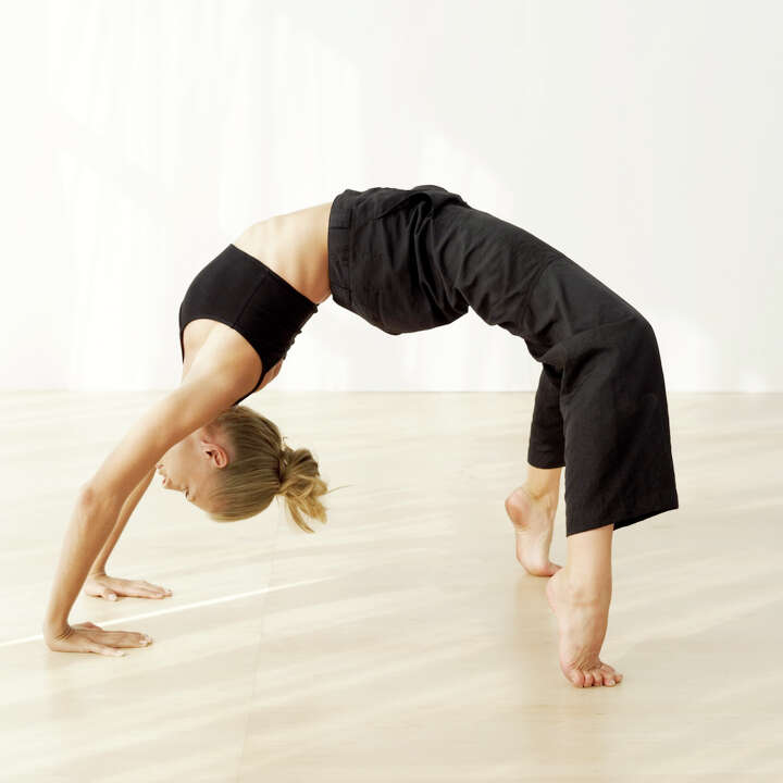 How to Stand Up From a Backbend