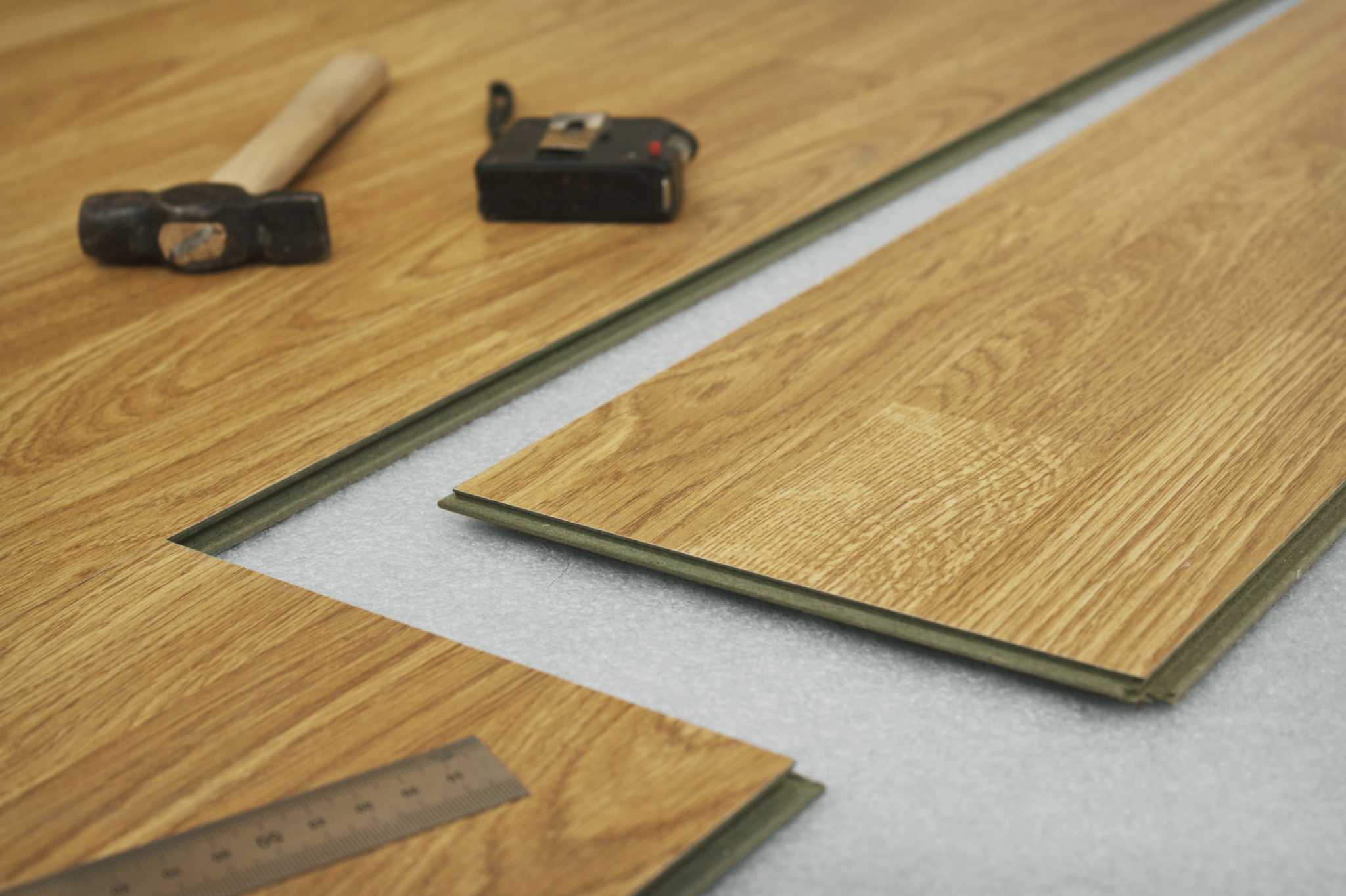 How to Install Ceramic Tiles With a Wood Trim Finished Edge