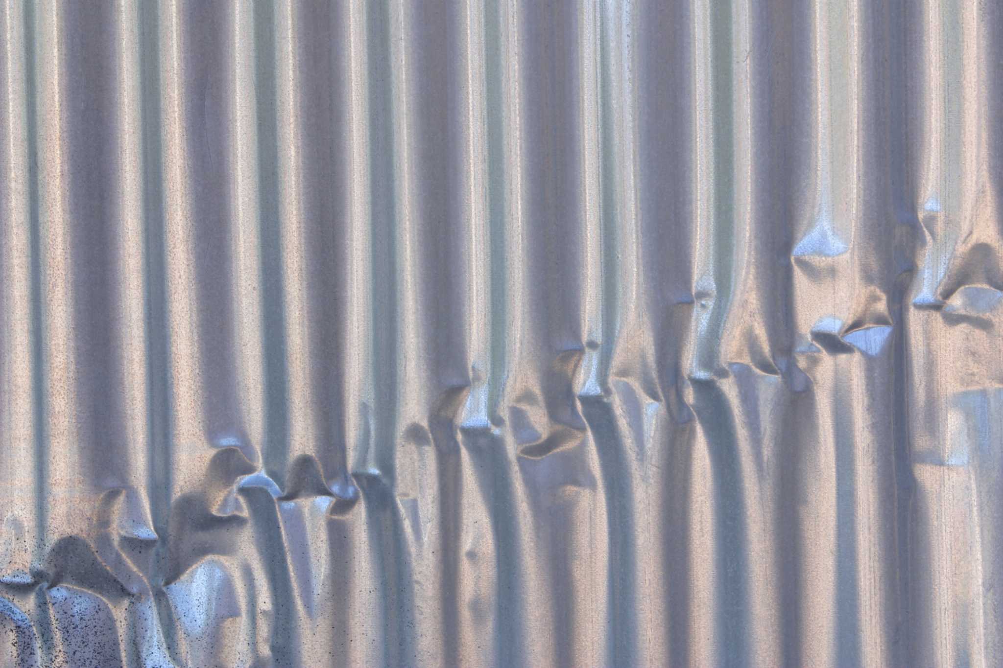 How to Install Corrugated Steel for a Home Bar