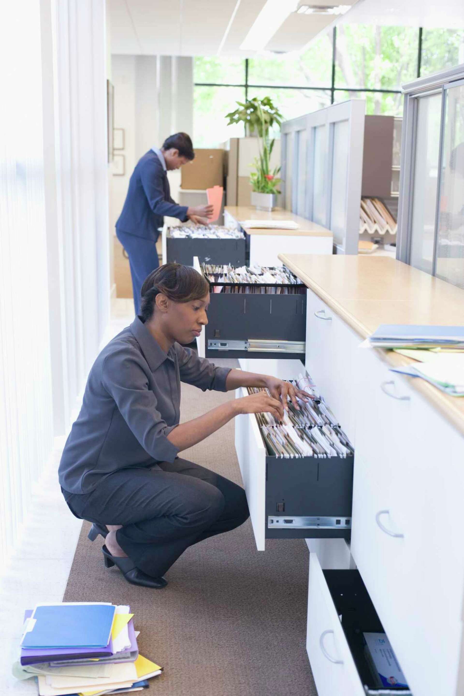 How to Remove a Lateral Filing Cabinet Drawer