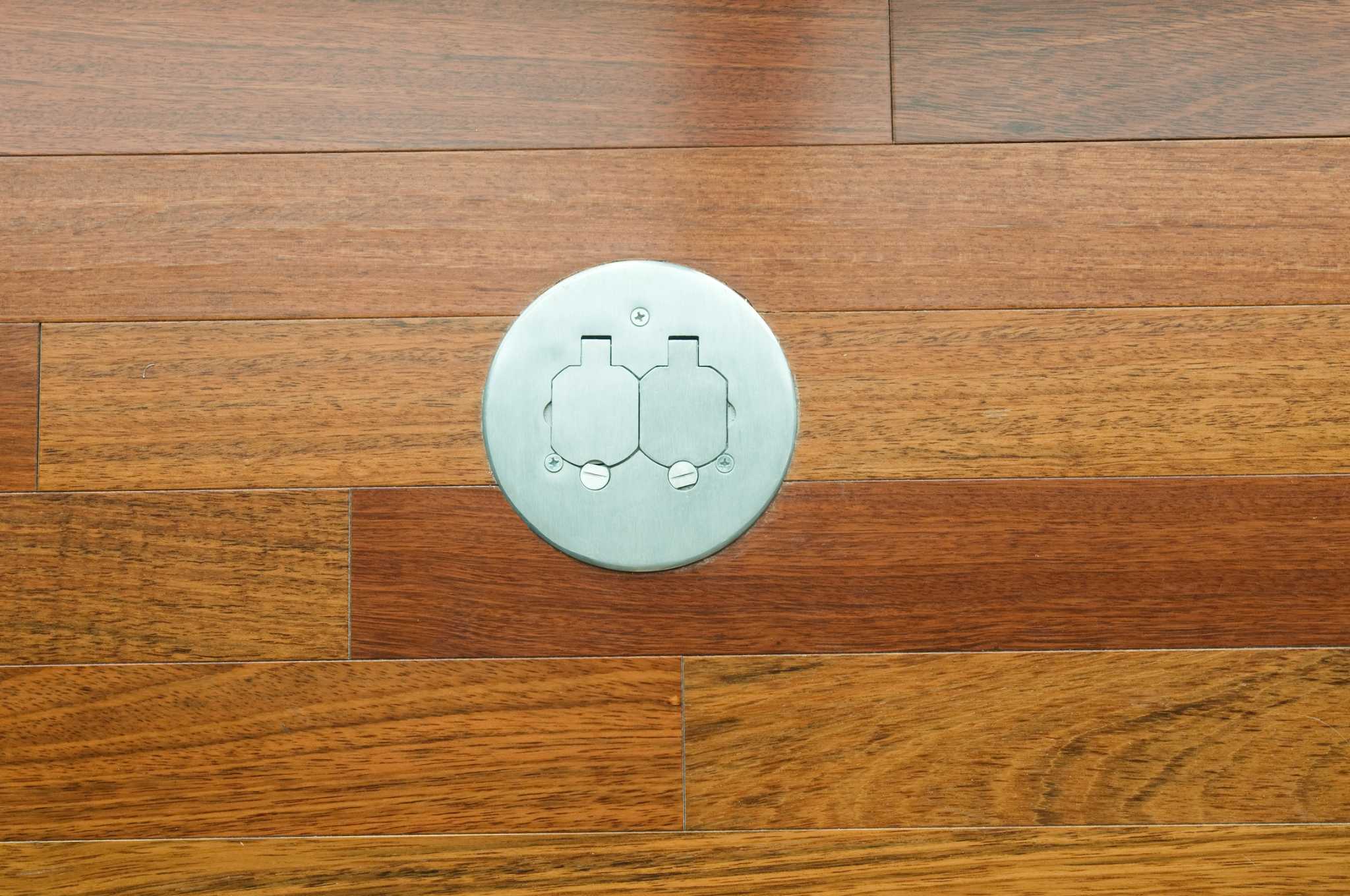 How to Install an Electical Outlet in a Wood Floor