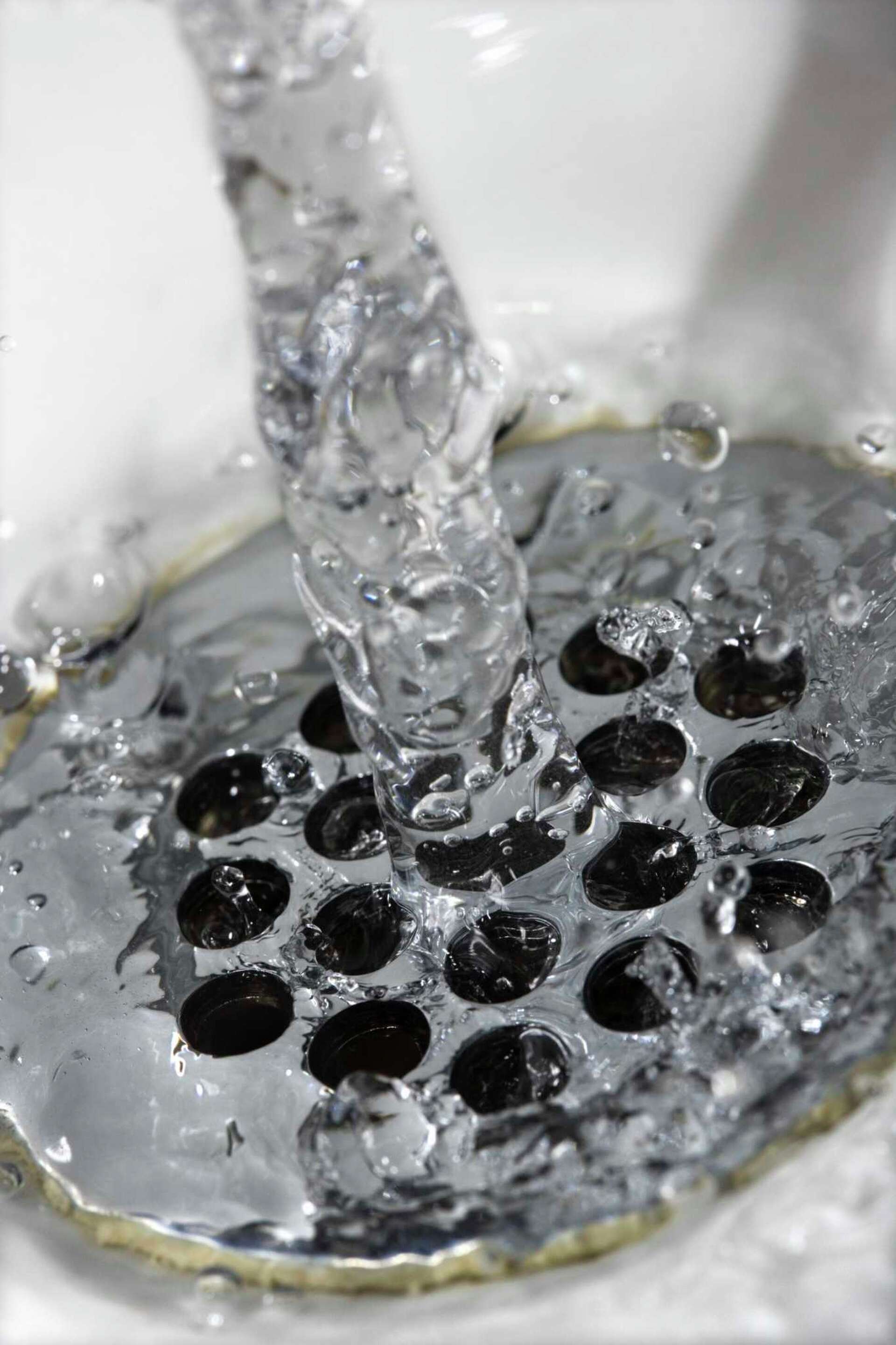 How to Remove a Stuck Locknut From a Sink Drain