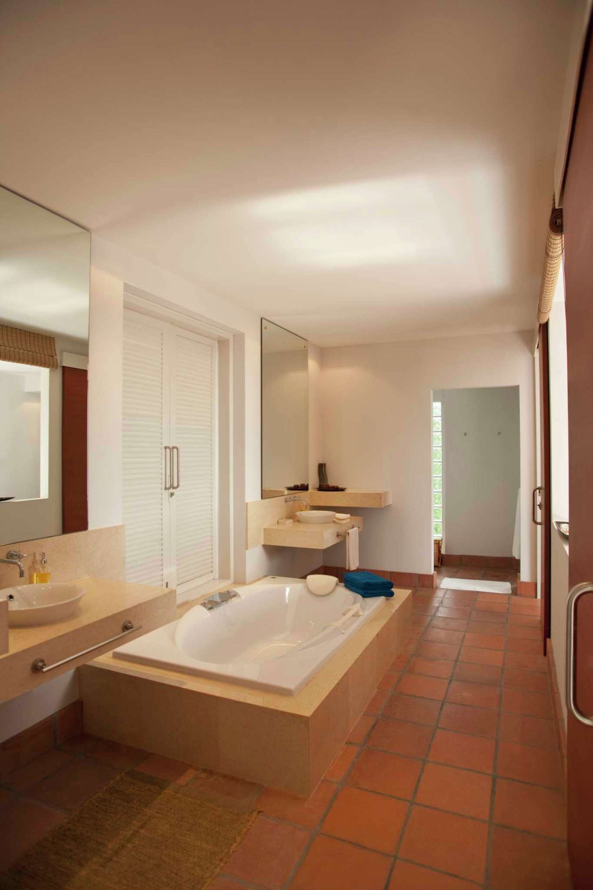 How to Set a Bathtub in a Bed of Mortar