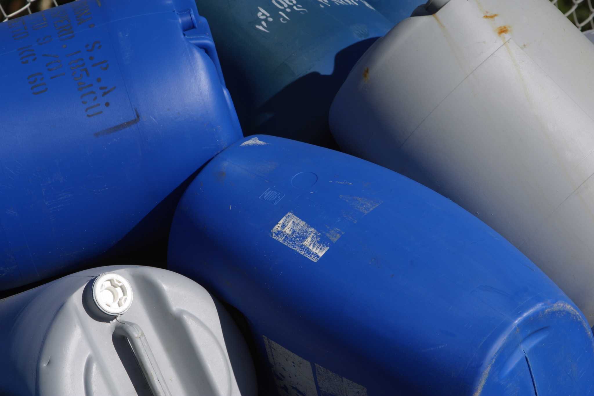 How to Make Holes in the Side of a Large Plastic Barrel for Growing Plants