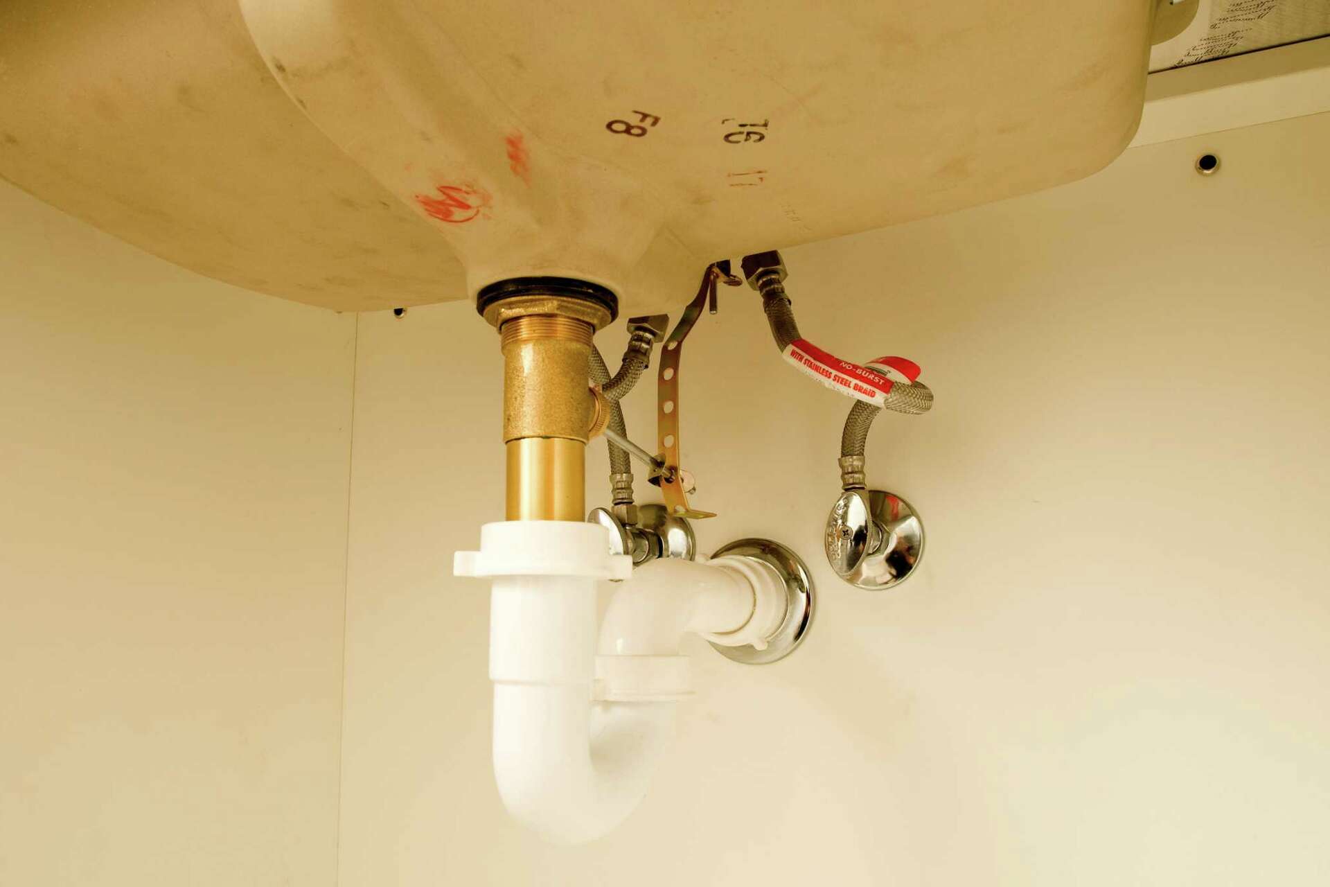 How to Get Something Out of a Bathroom Sink Drain