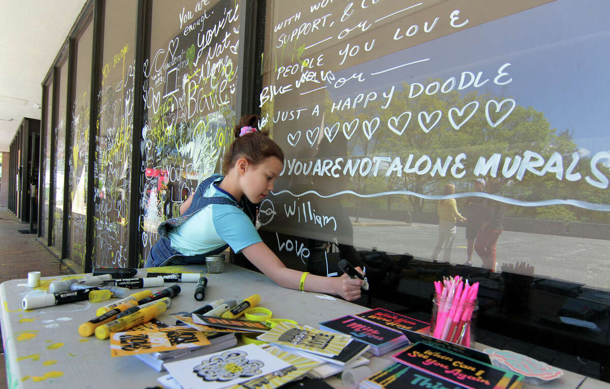 In Photos: Darien residents paint a message of inclusion