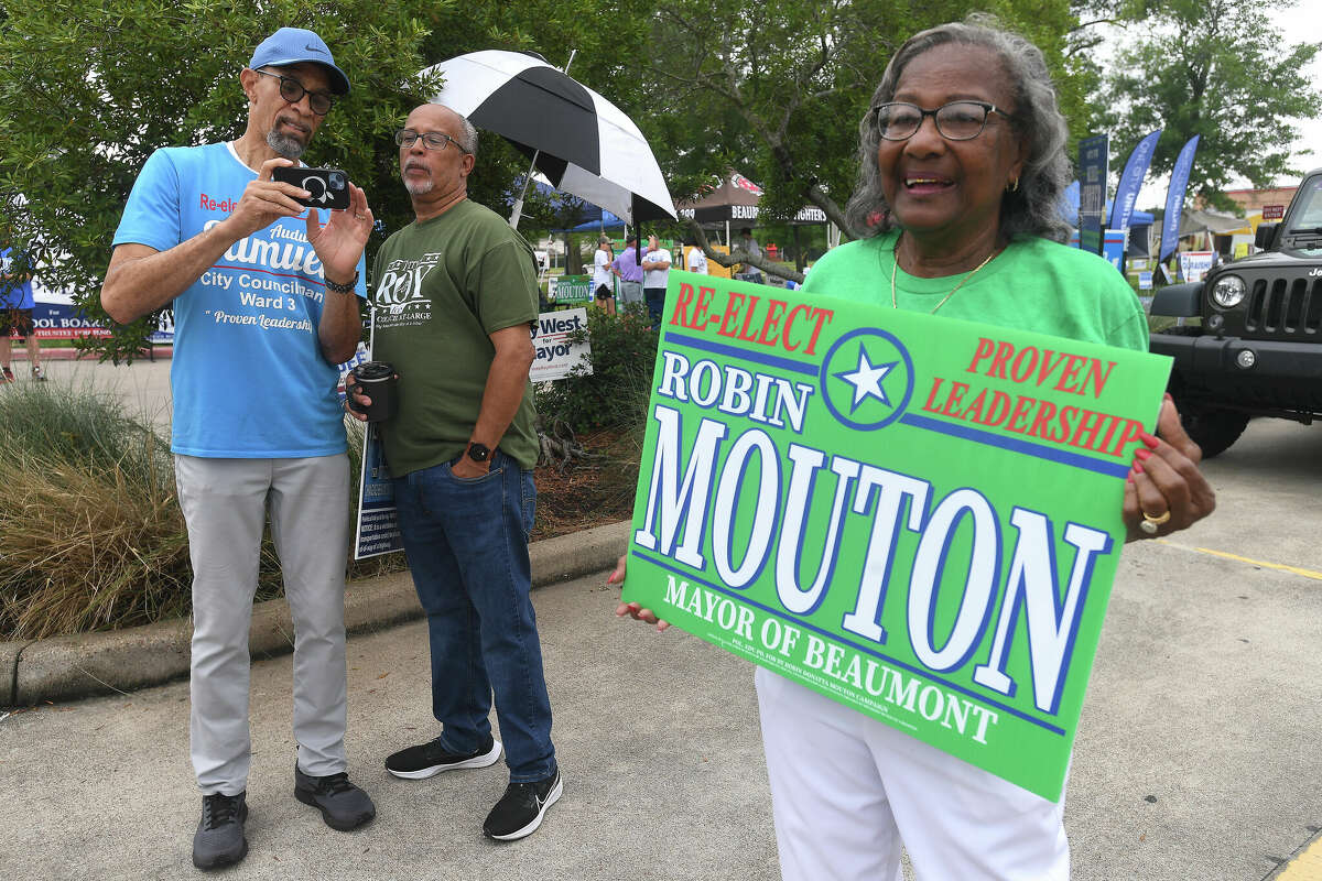 Campaigners and candidates worked the polls on election day Saturday
