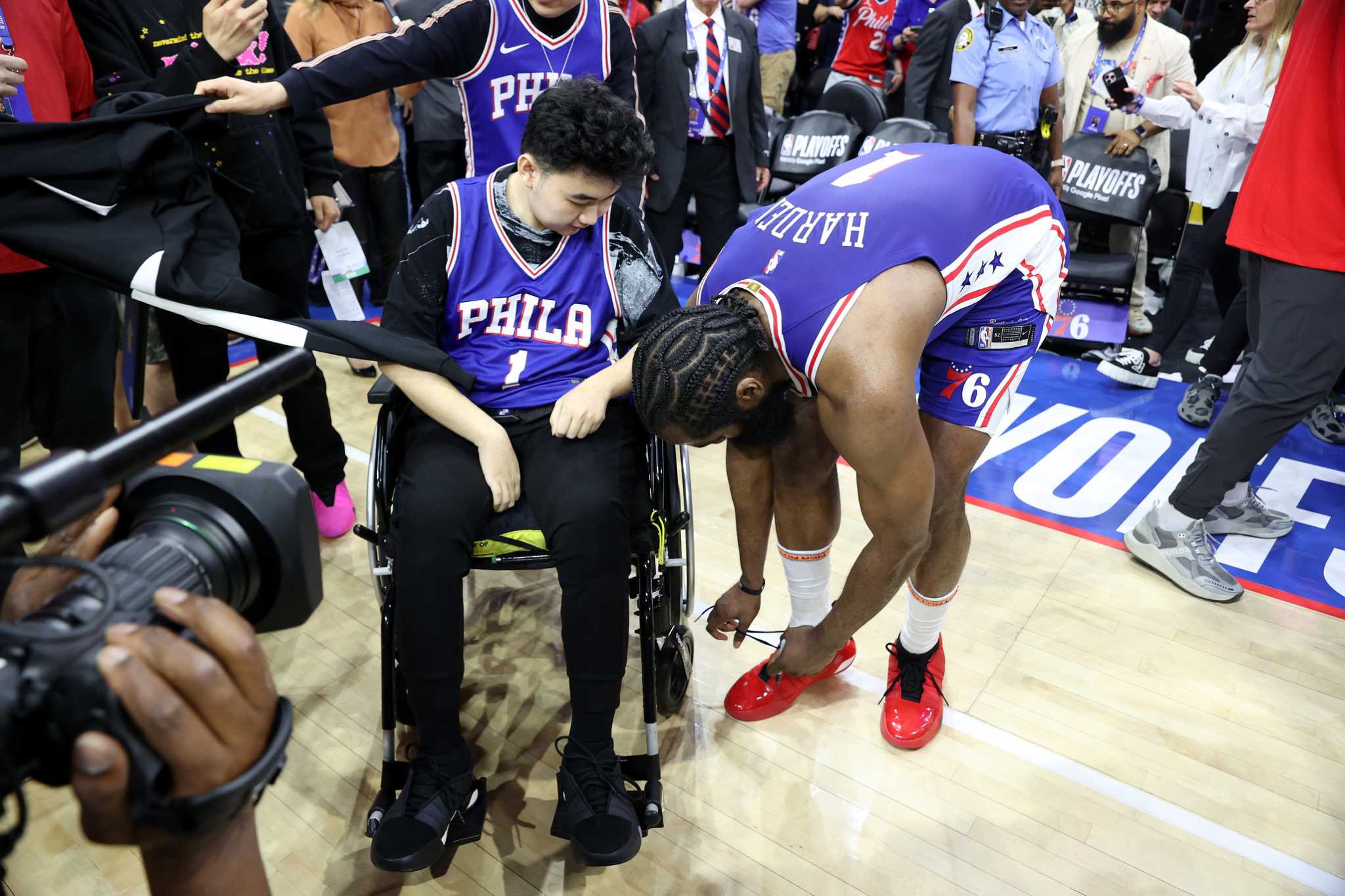 James Harden brings Michigan State shooting survivor John Hao on court