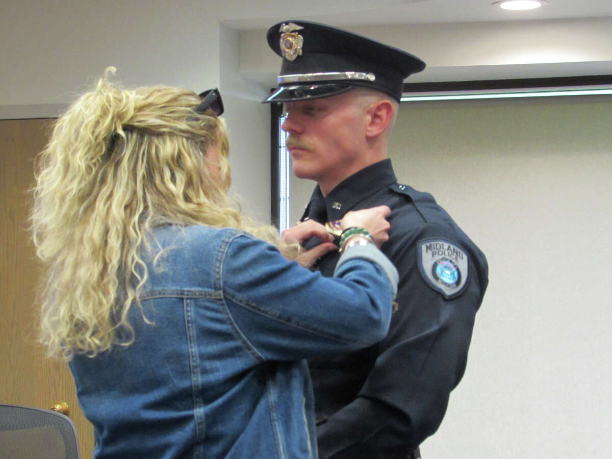 Midland Police Department adds three new officers at badge ceremony