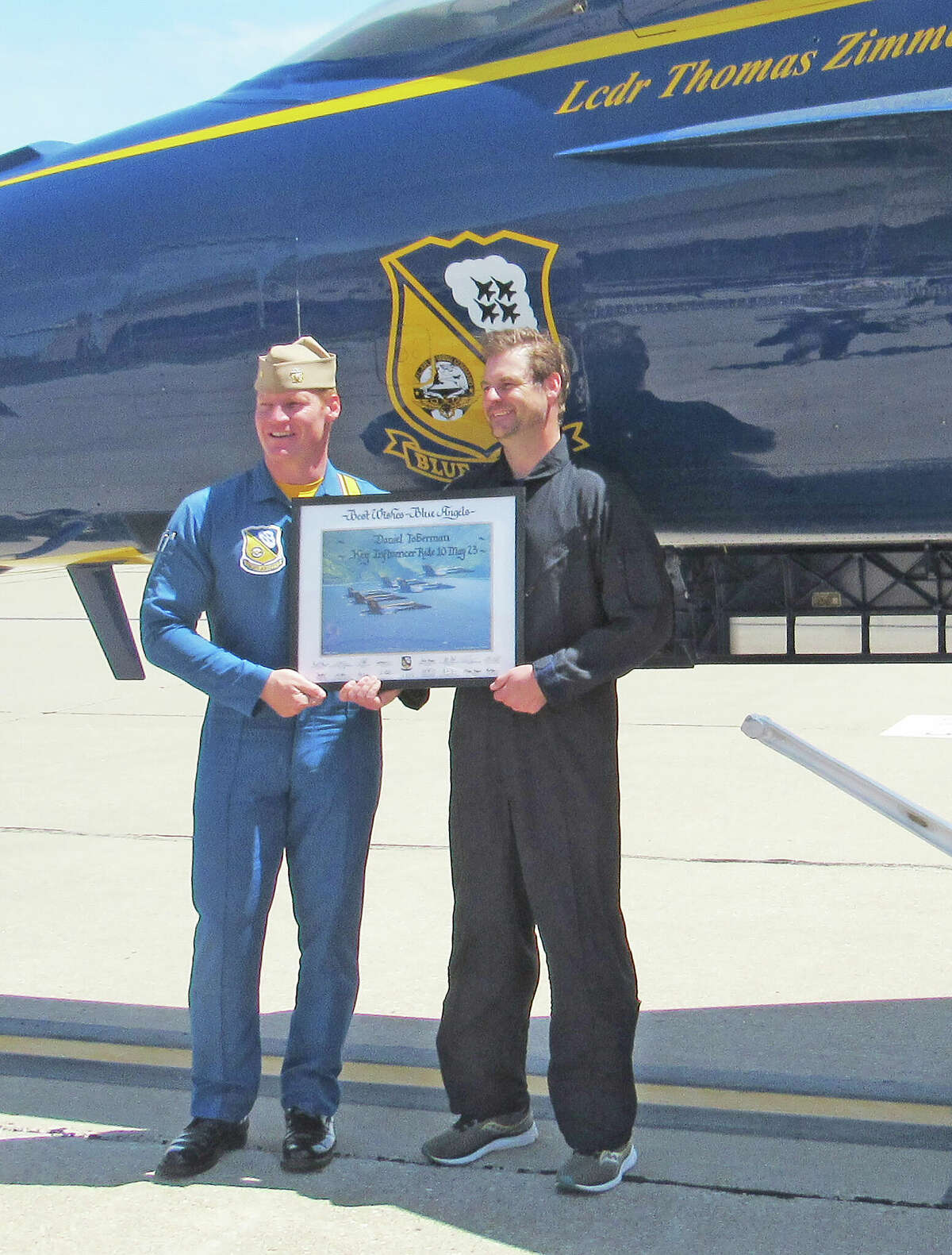 Collinsville principal Daniel Toberman flies with the Blue Angels