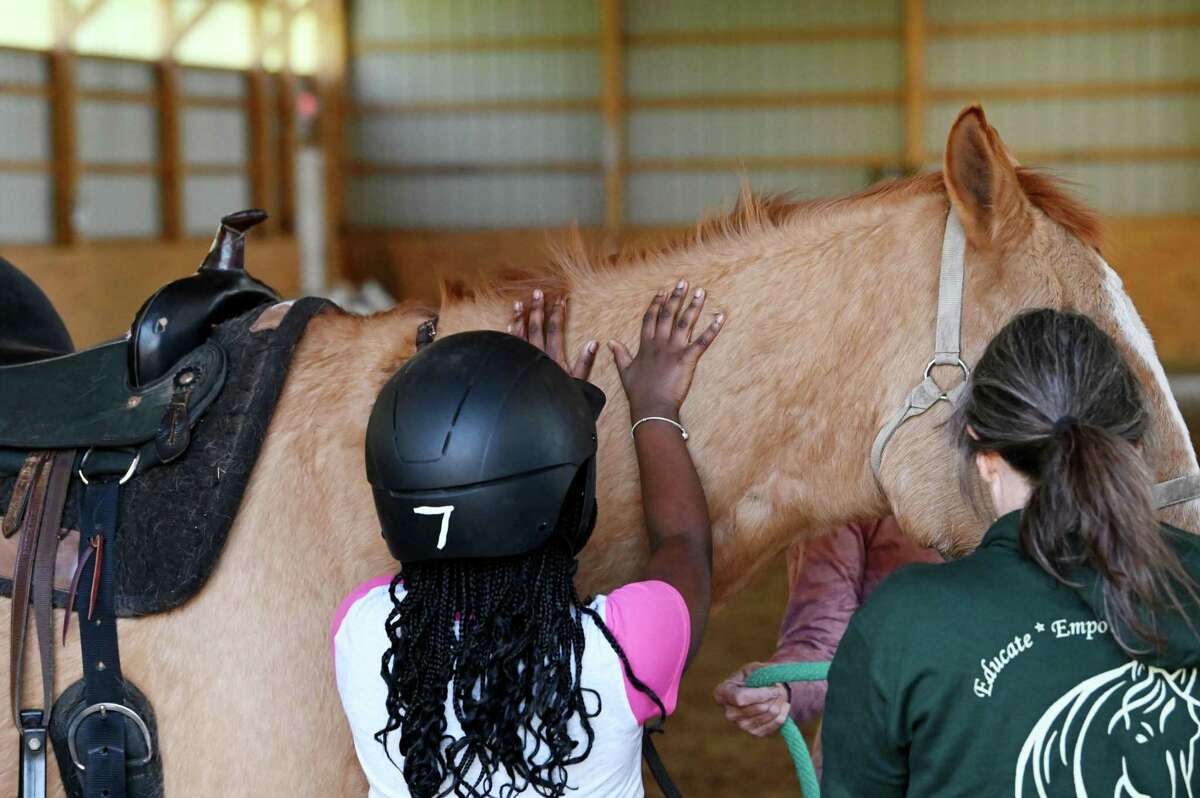 Victoria Acres empowers disabled students with horseback riding