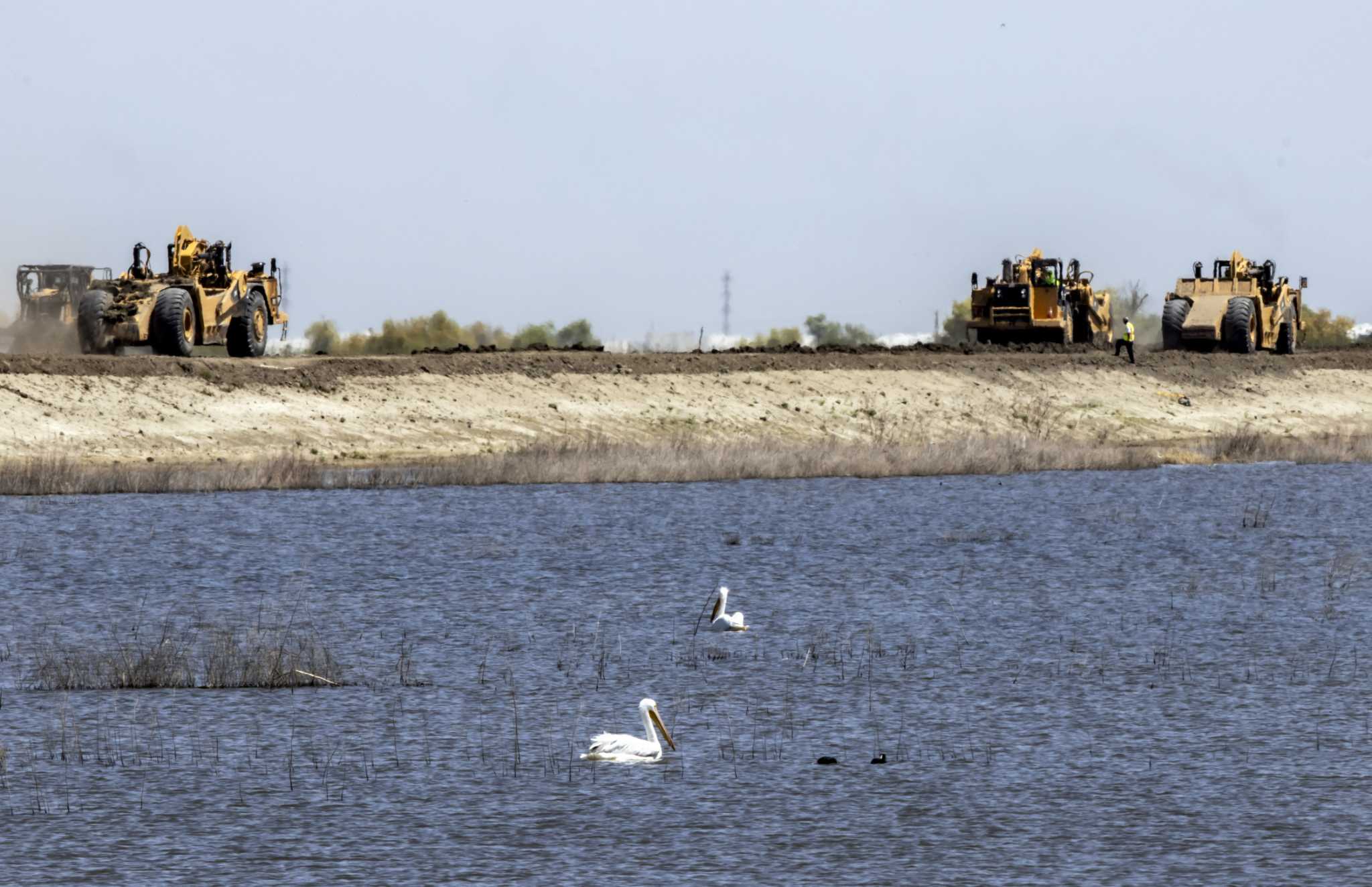 California city threatened by revived lake gets levee funds