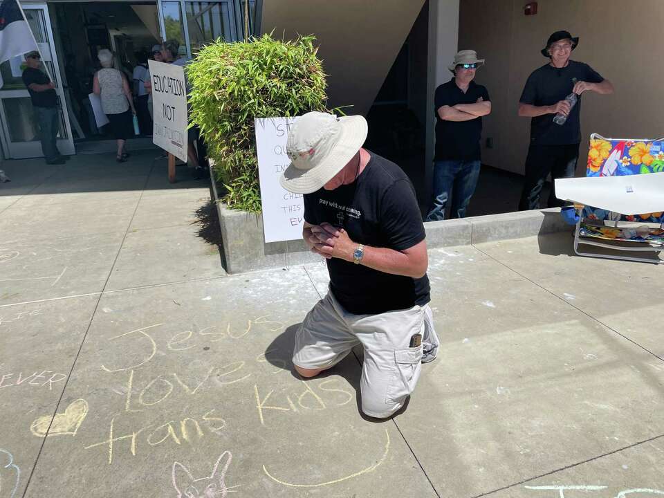 Protest against East Bay drag queen story time is tense but peaceful