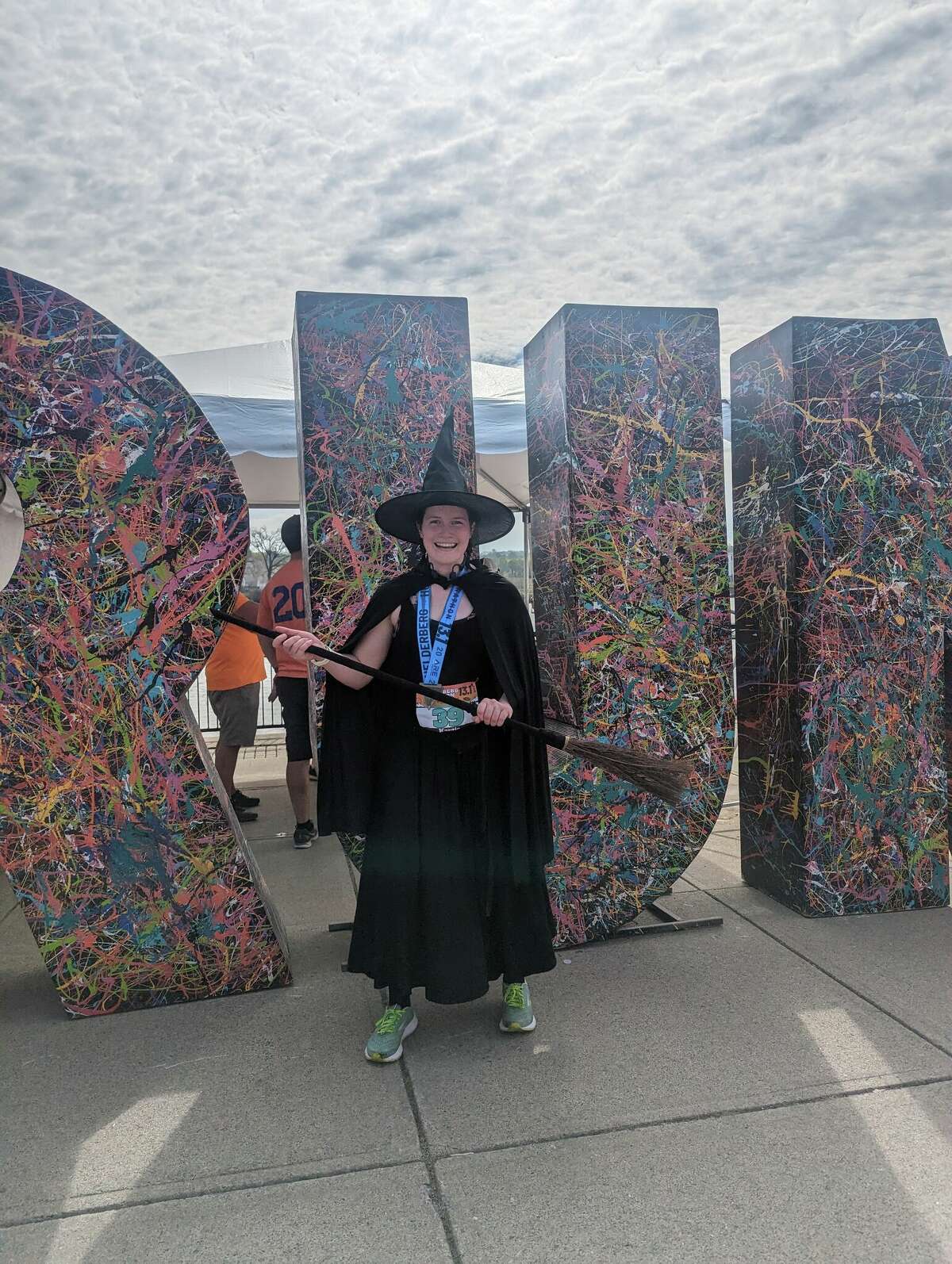 Runner sets record for half marathon dressed as witch in Albany race