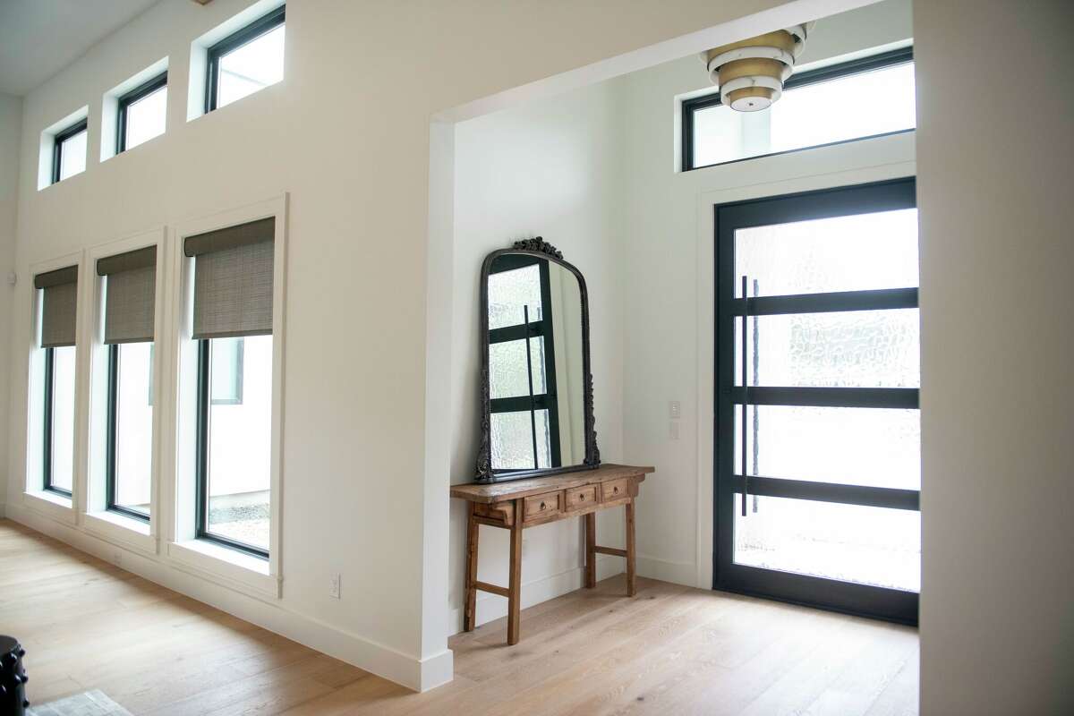 San Antonio smart house controls lights, security, music, shower temp