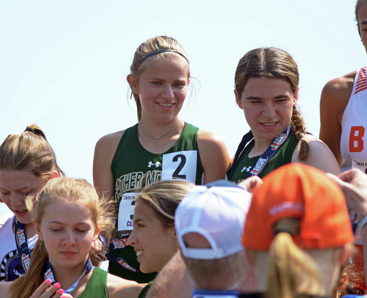 Elena Rybak defends 1,600 state title; Father McGivney medals five