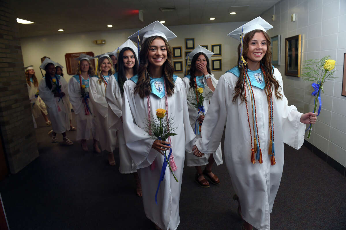 Mercy high graduates 84 in Middletown CT: helping the 'world bloom'