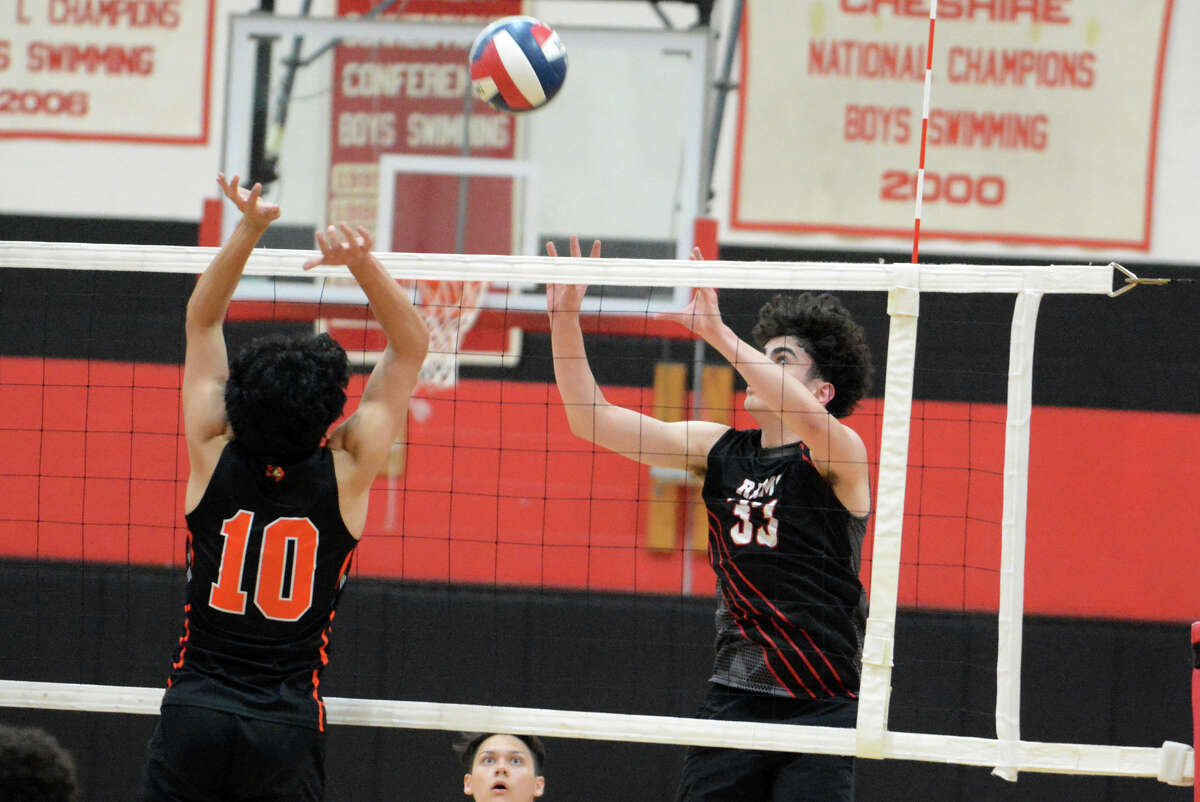 Cheshire defeats Shelton for SCC boys volleyball title.