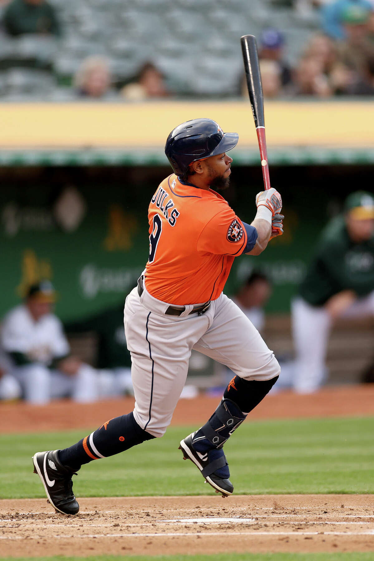 Corey Julks, Houston Astros defeat Oakland A's in series opener