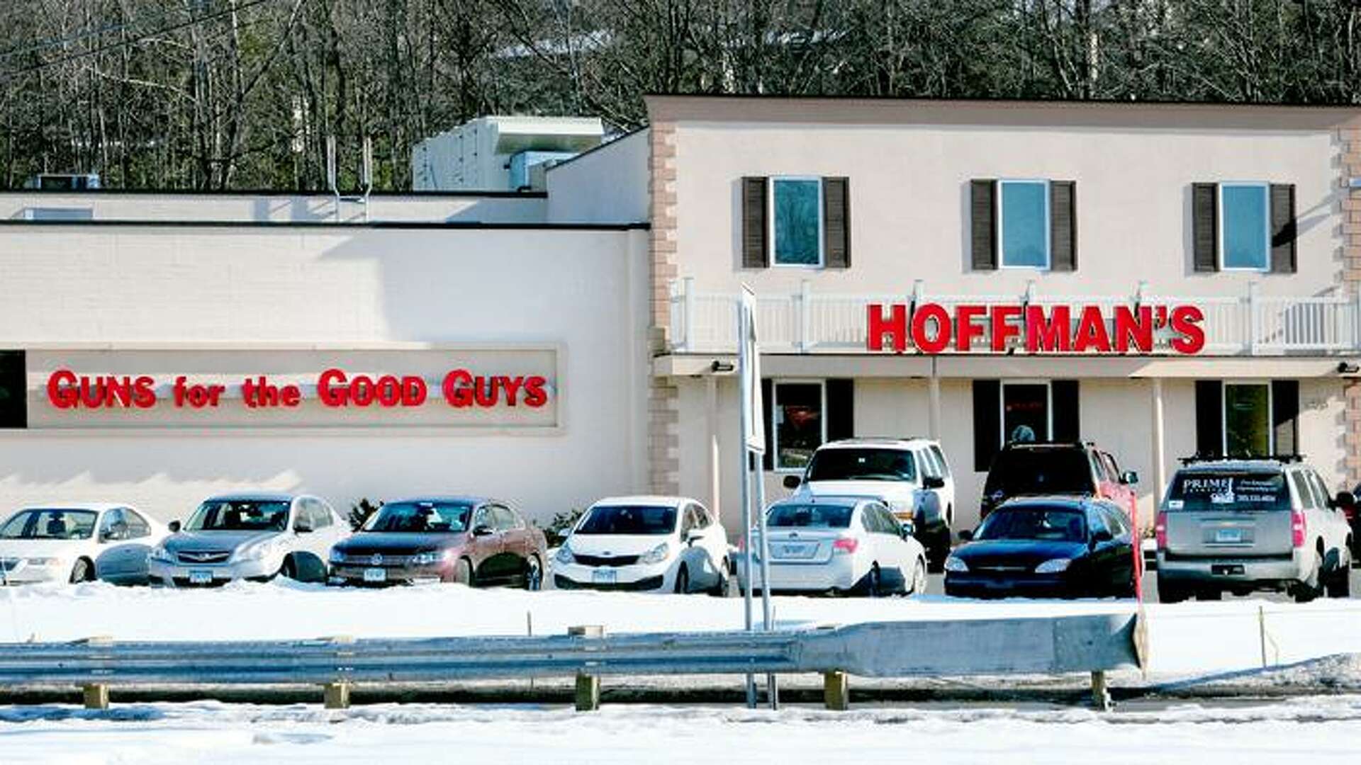 Newington gun store owner charged with firearm theft, police say