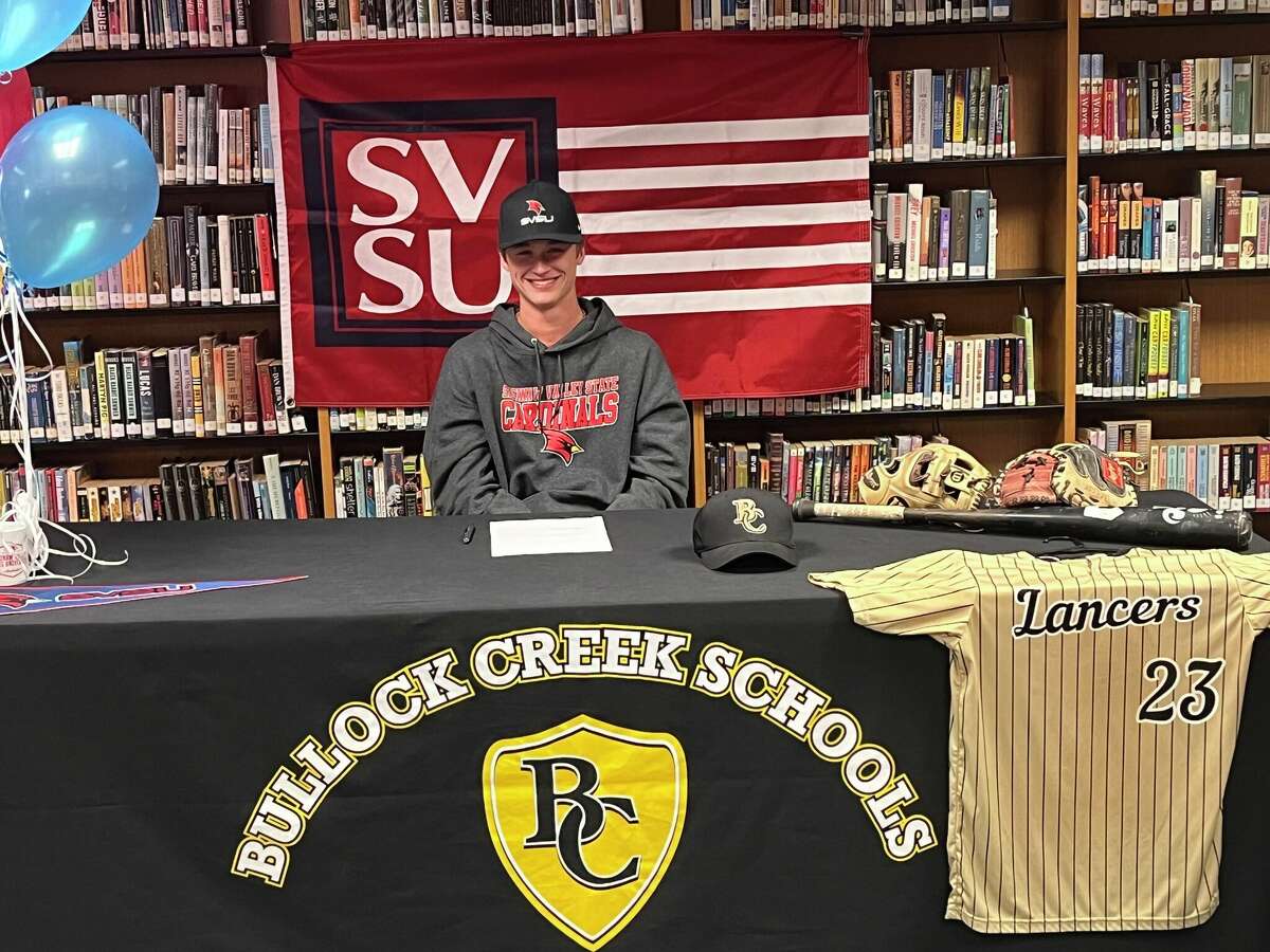 Creek athletes sign to play in college