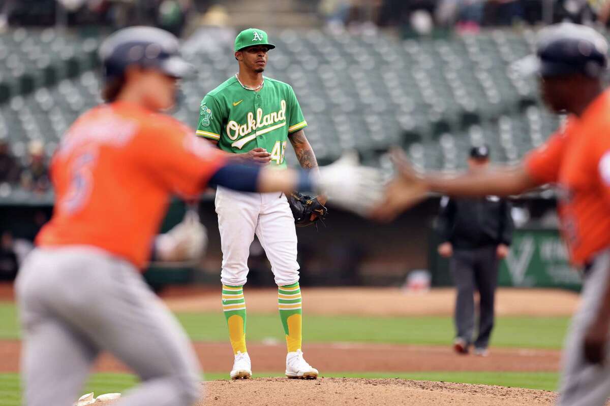 A’s give up seven homers to Astros, lose 11th straight game