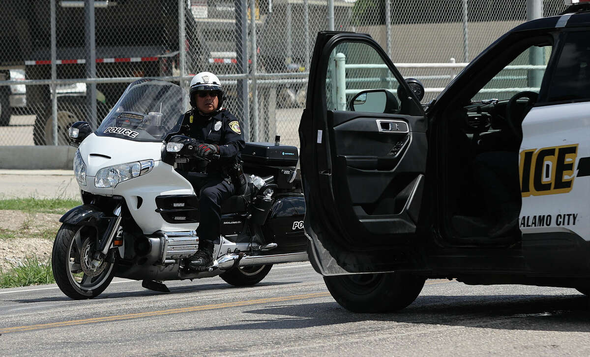 Officer injured by pickup truck while guiding funeral on motorcycle