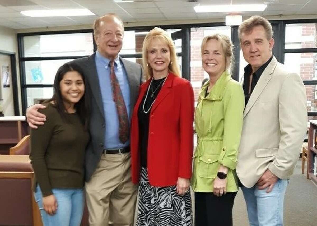 Retired Conroe math teacher awards scholarships to 9th graders as moti