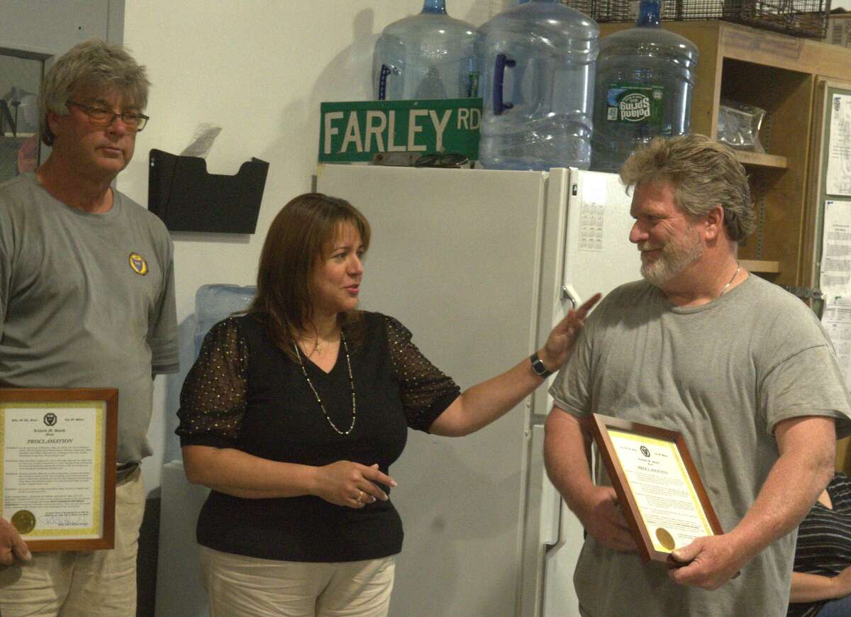 Milford honors two city workers for helping save crash victim