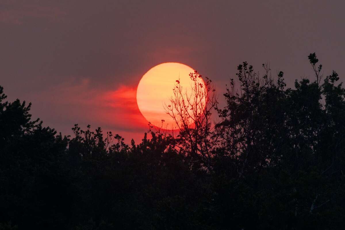 In Photos: Poor air quality in CT creates hazy skies, red sun