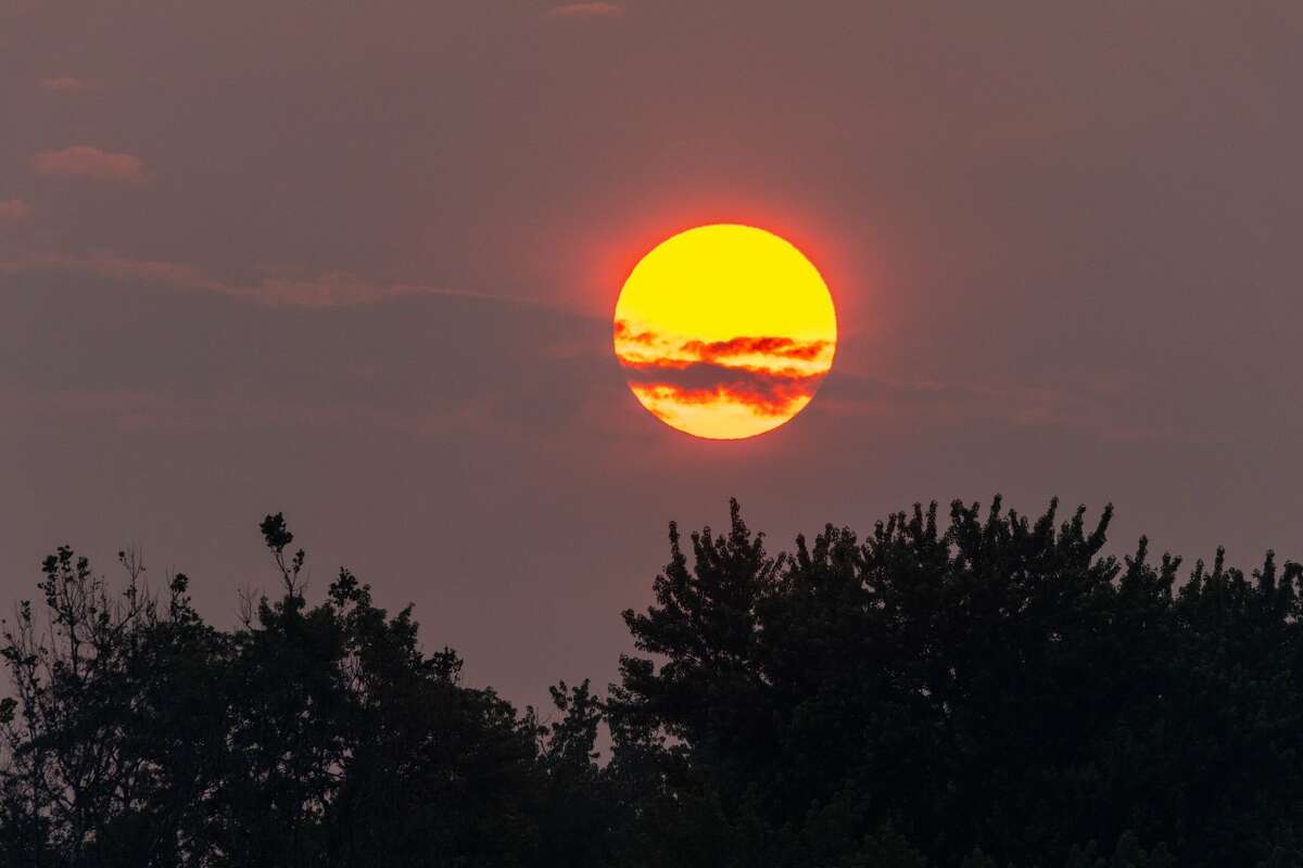 In Photos: Poor air quality in CT creates hazy skies, red sun