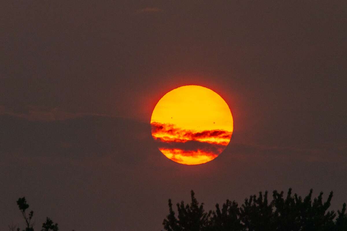 In Photos: Poor air quality in CT creates hazy skies, red sun