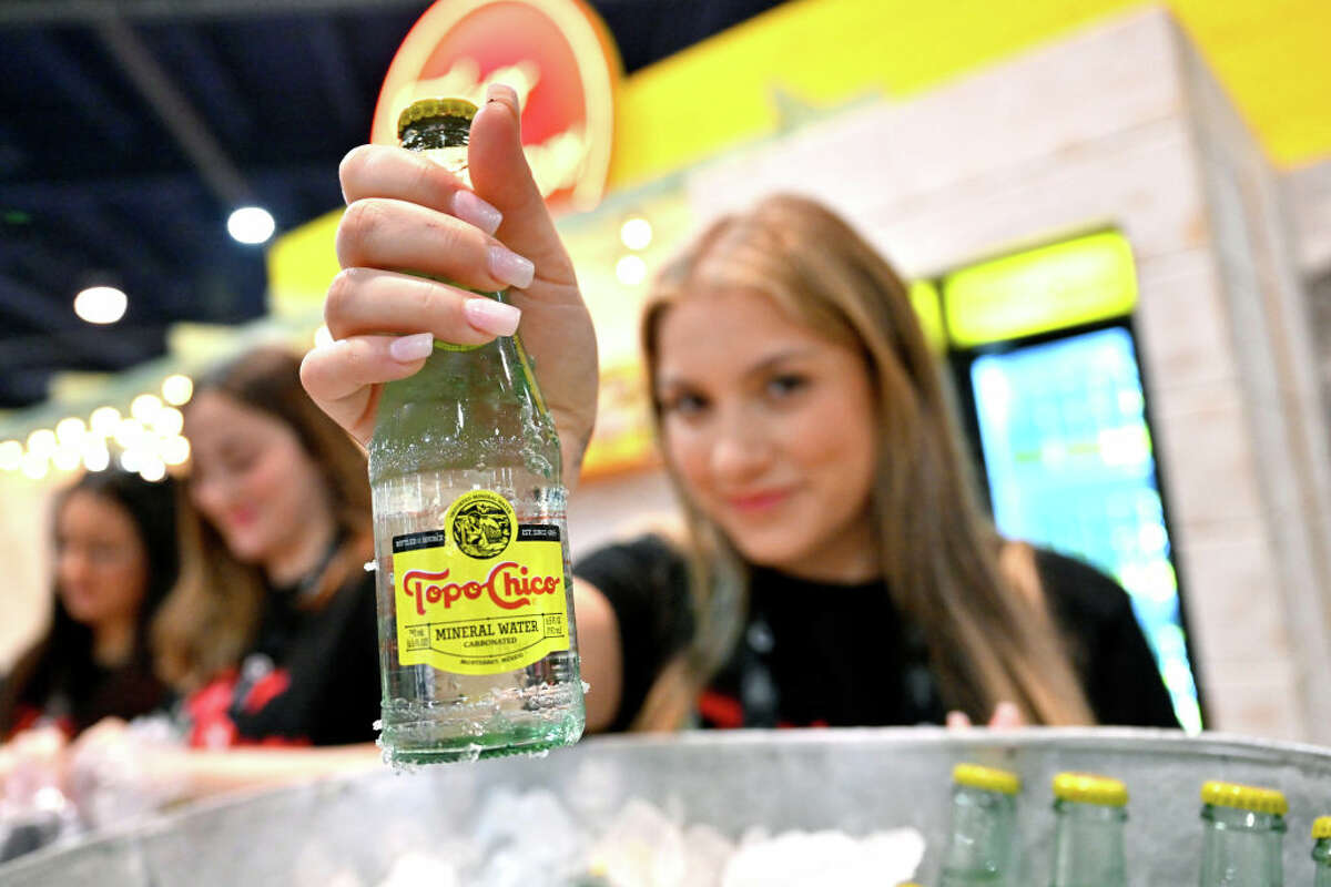 Topo Chico asks Texas artist to design 70+ shoes with their logo on it