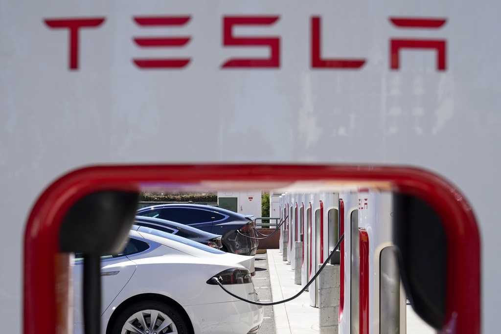 GM's electric vehicles will gain access to Tesla's vast charging network