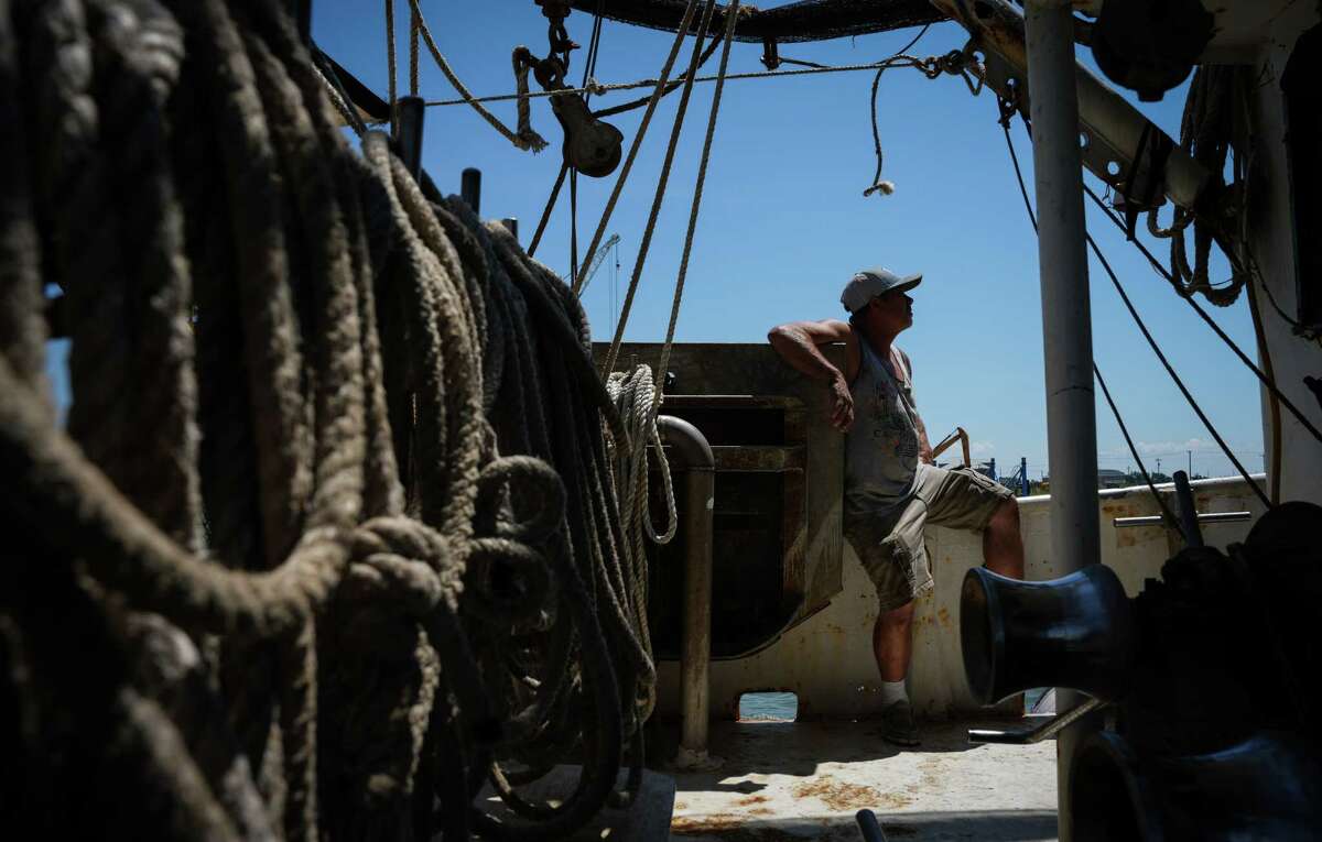 Small fishing boats displaced by big LNG in area ravaged by hurricanes