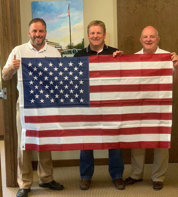 Ieuter Insurance Group giving out free flags in honor of Flag Day