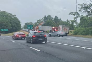 Cops: Person hospitalized in box truck crash on I-84 in East Hartford