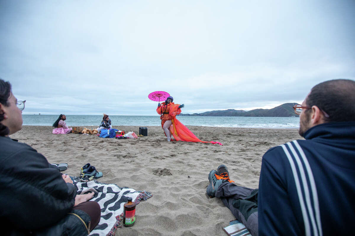 The heart of SF beats on at a sunset drag show on Baker Beach