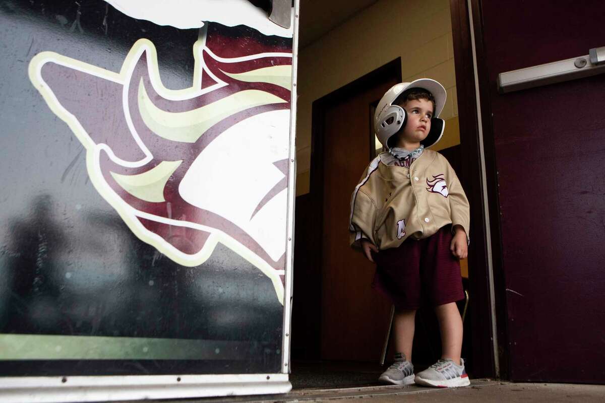 Magnolia West celebrates state championship baseball team with parade.