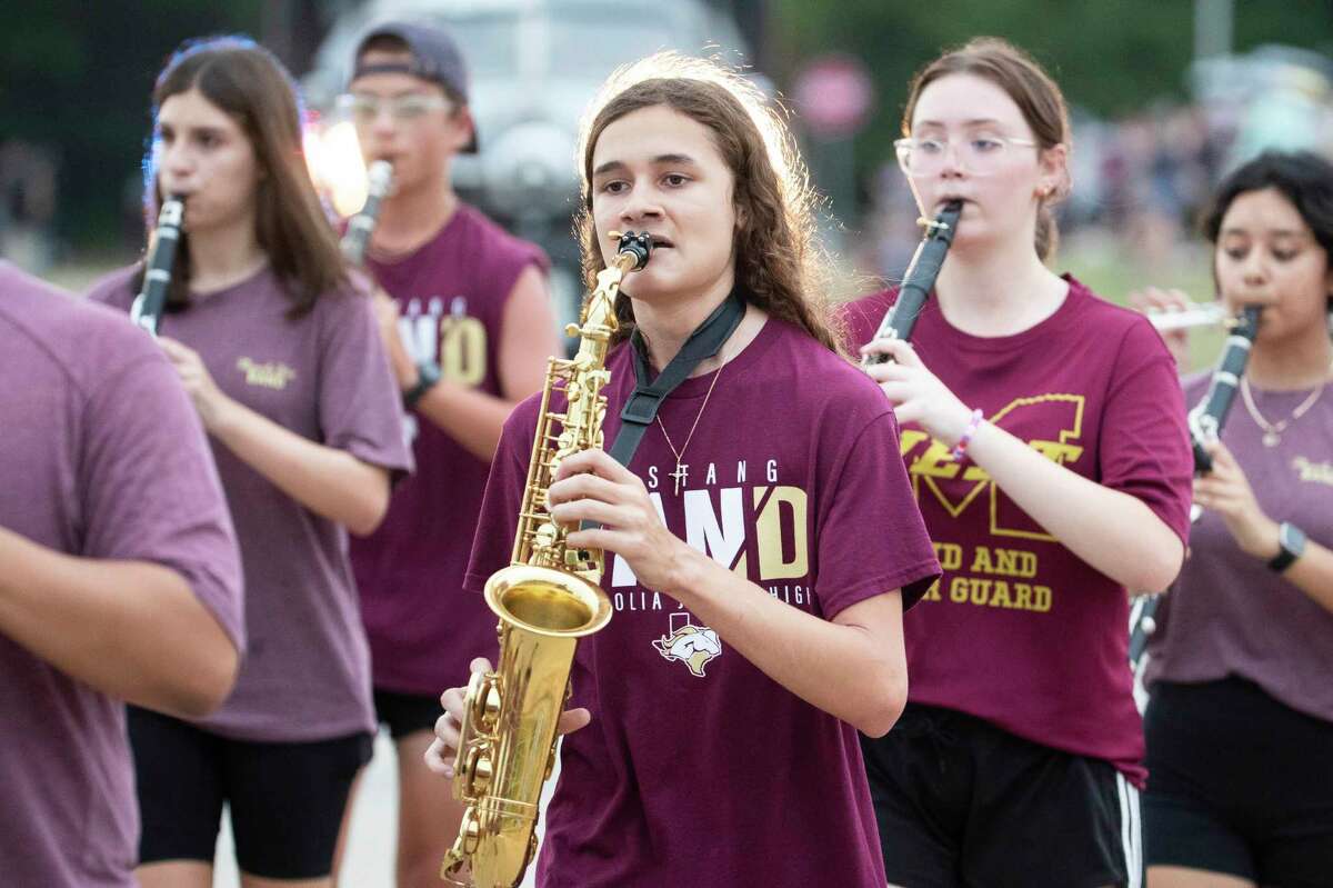 Magnolia West celebrates state championship baseball team with parade.