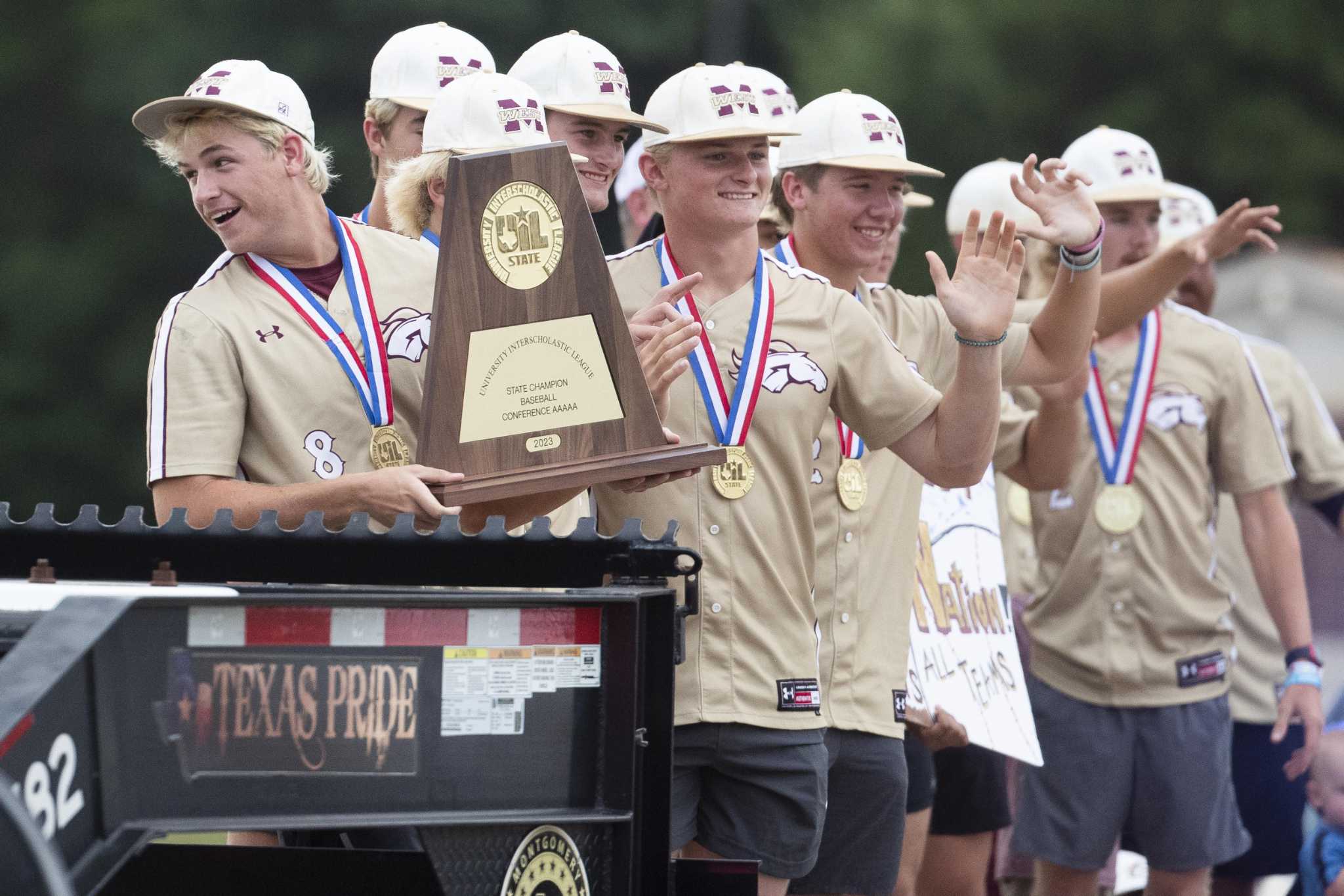 Magnolia West celebrates state championship baseball team with parade.
