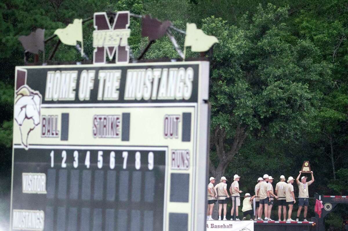 Magnolia West celebrates state championship baseball team with parade.