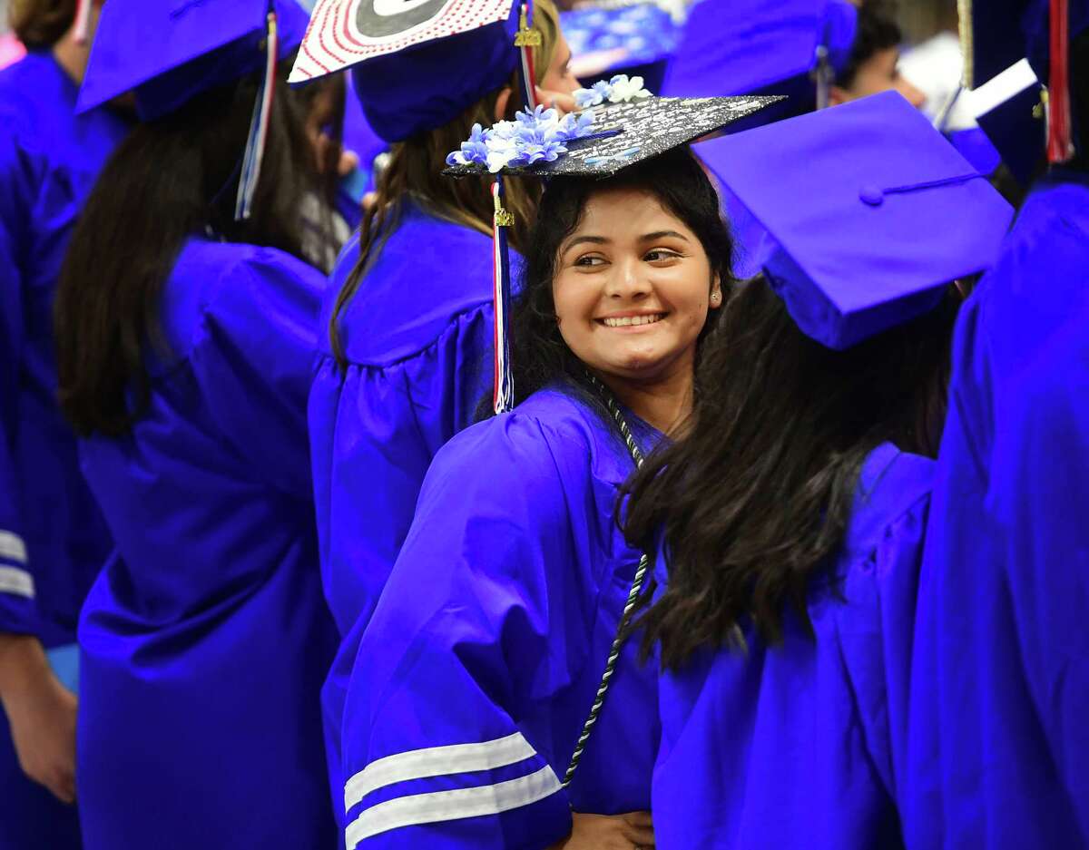 Rain forces Norwalk's Brien McMahon High to move graduation inside