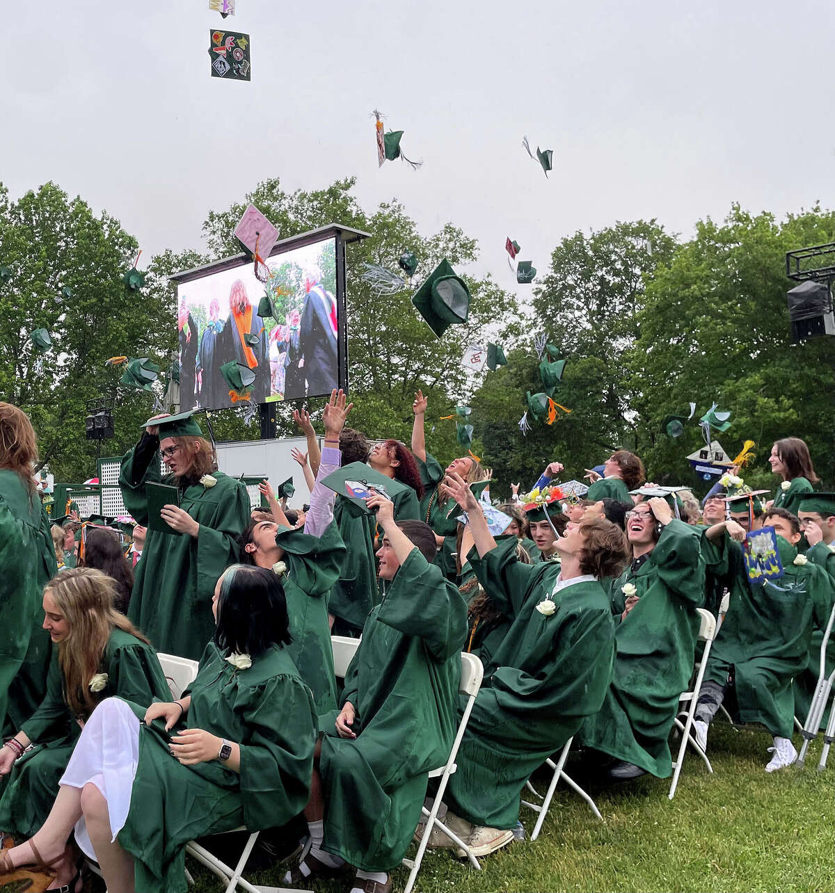 Guilford class of 2023 weather stormy commencement on green